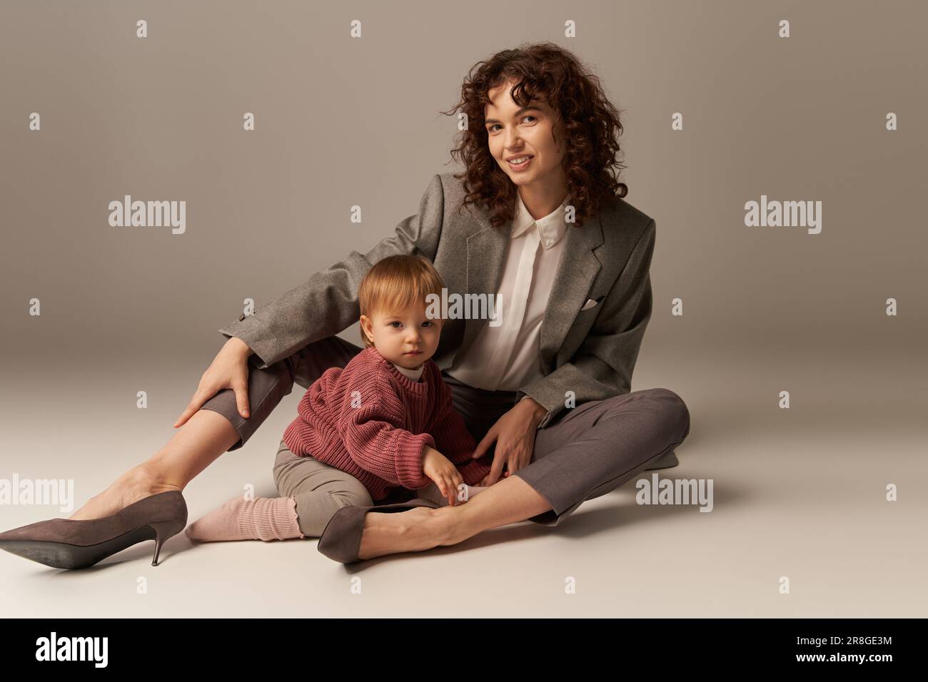 parenting and family, balanced lifestyle, cheerful mother with curly ... parenting and family, balanced lifestyle, cheerful mother with curly ...