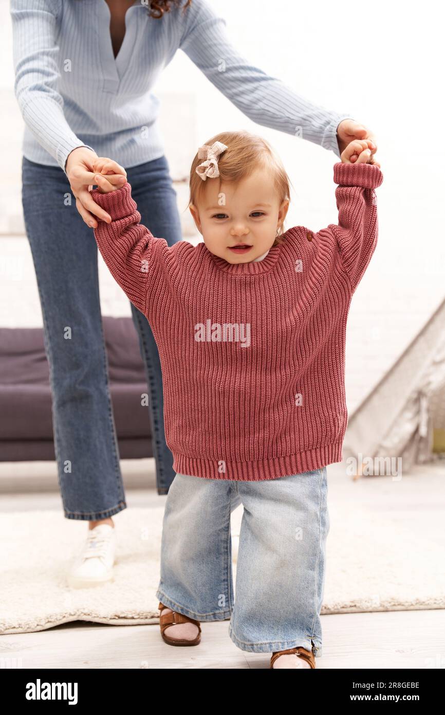 balanced lifestyle, family relationships, working mother holding hands ...