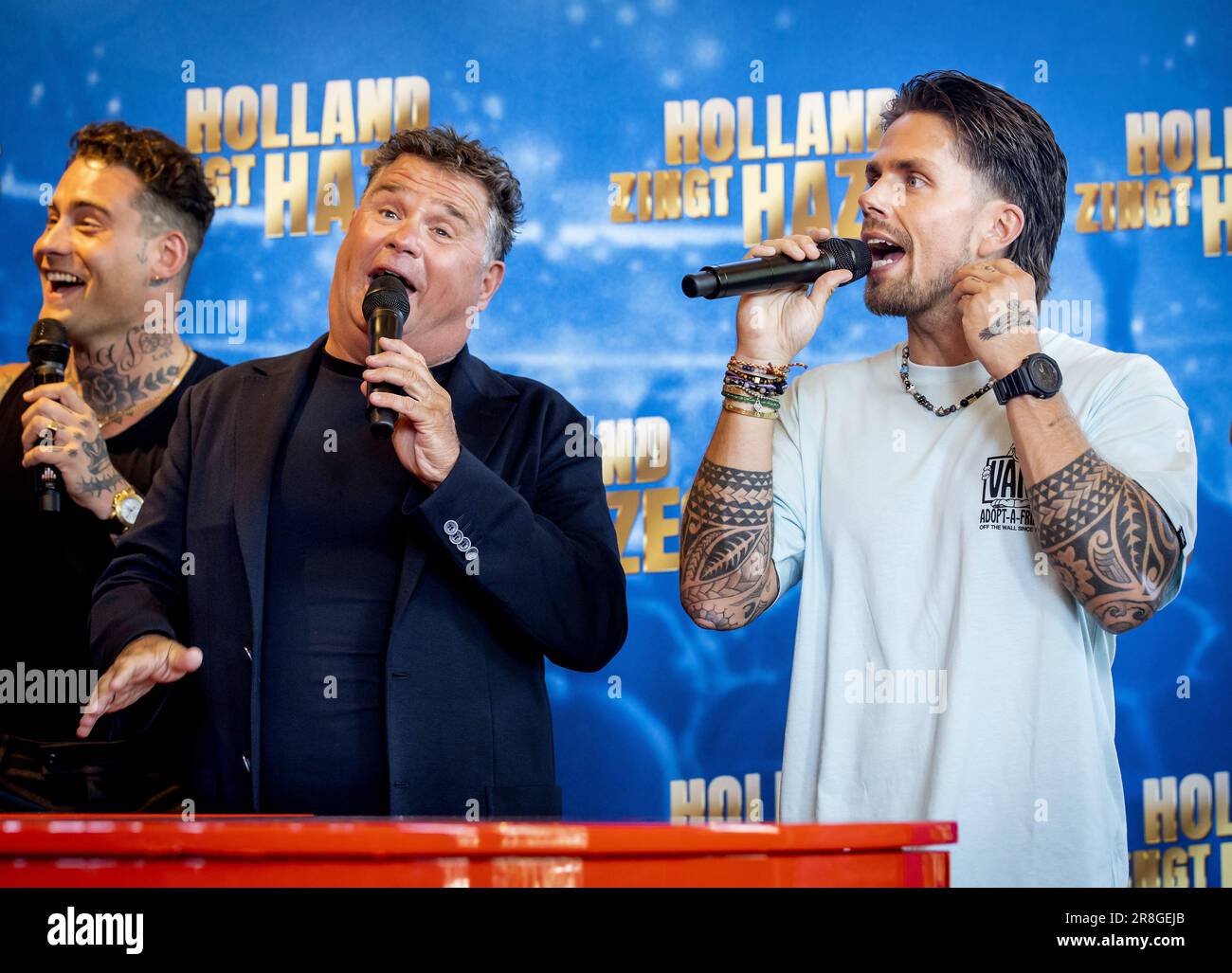AMSTERDAM - 21/06/2023, Douwe Bob, Wolter Kroes and Andre Hazes during ...