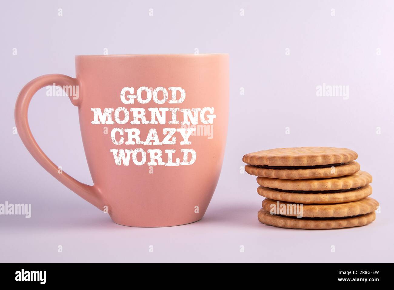 Good Morning crazy world. A cup of coffee and a stack of cookies on a ...