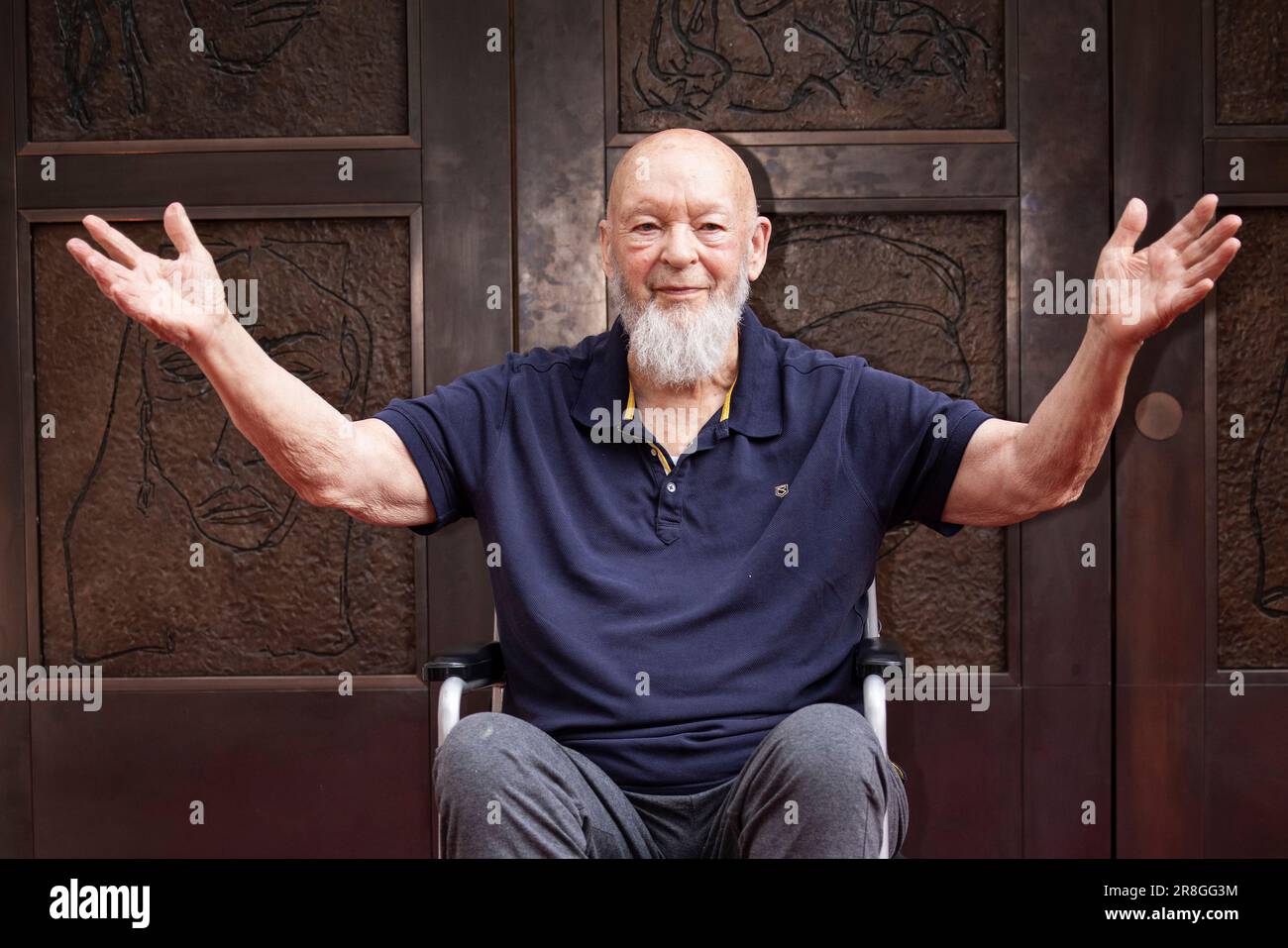 Michael Eavis poses for photographers upon arrival at the National ...