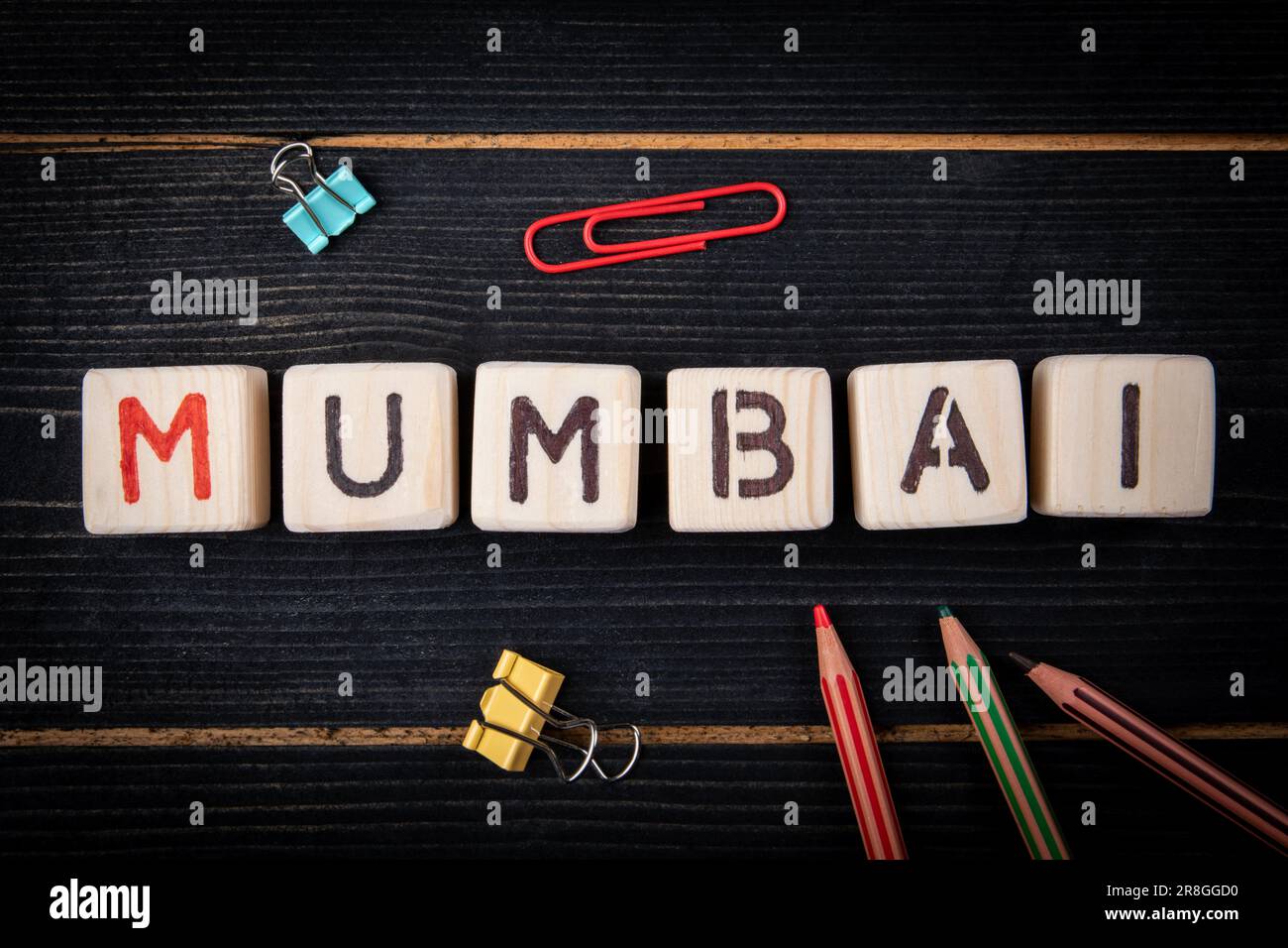 MUMBAI a large city in India. Word from alphabet blocks on a dark ...