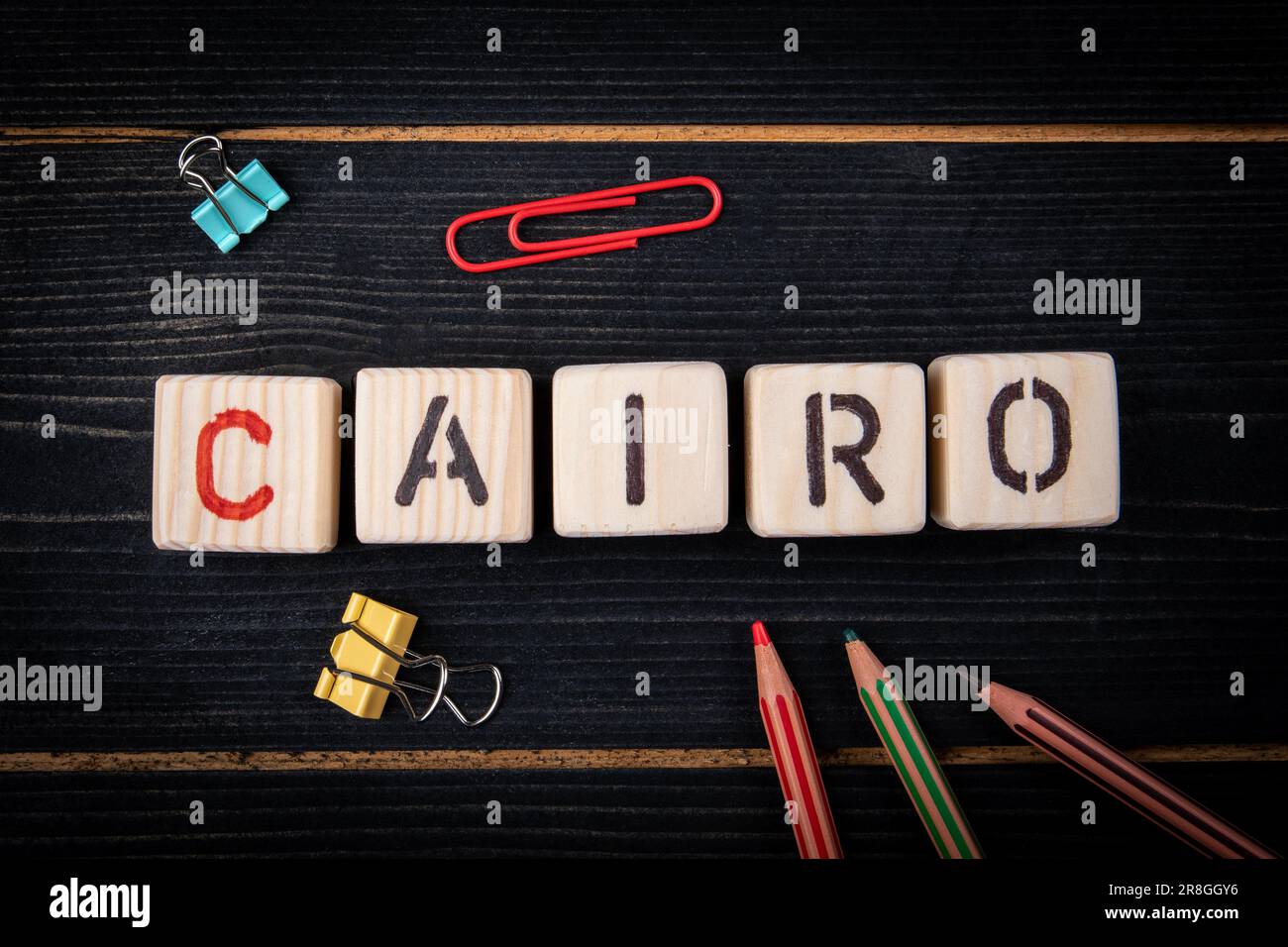 CAIRO. City name from blocks on a dark wood texture background Stock ...