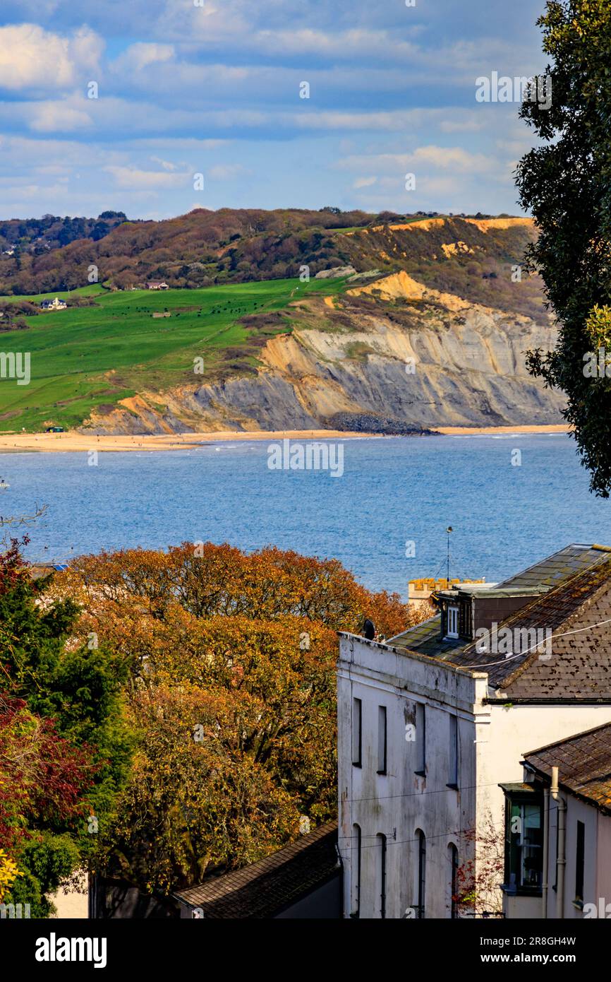 A slump of the unstable cliffs across the beach at Charmouth viewed ...