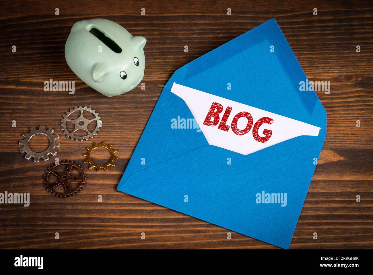 BLOG Concept. Blue letter envelope on dark wood background Stock Photo ...