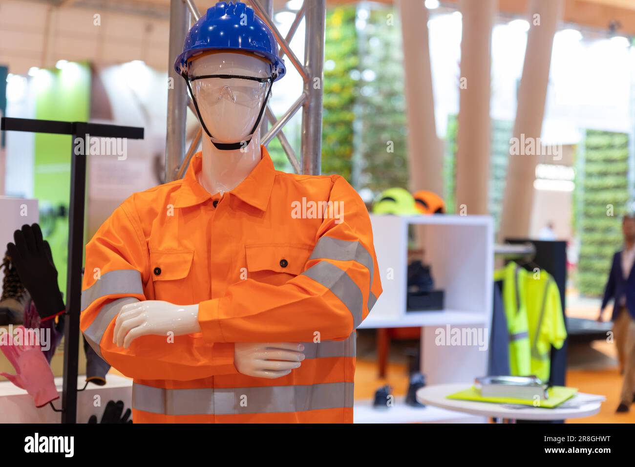 Construction workwear overalls on a mannequin at the expo. Mid shot ...