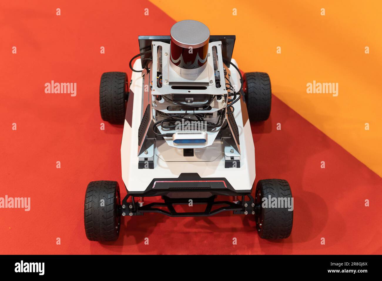 Driverless electric self-driving robot at the expo. Mid shot Stock ...