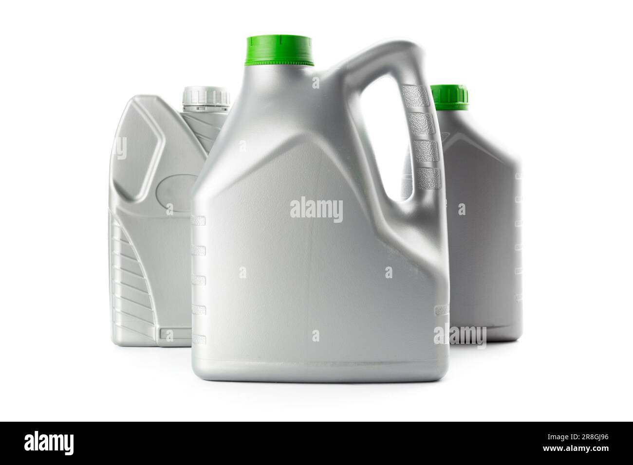 Plastic bottles from automobile oils isolated on white Stock Photo - Alamy