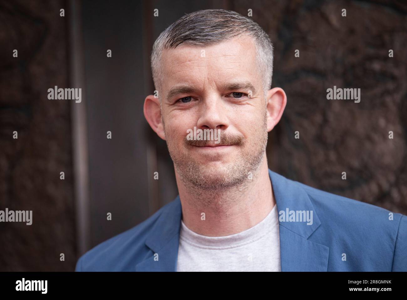 Russell Tovey poses for photographers upon arrival at the National ...