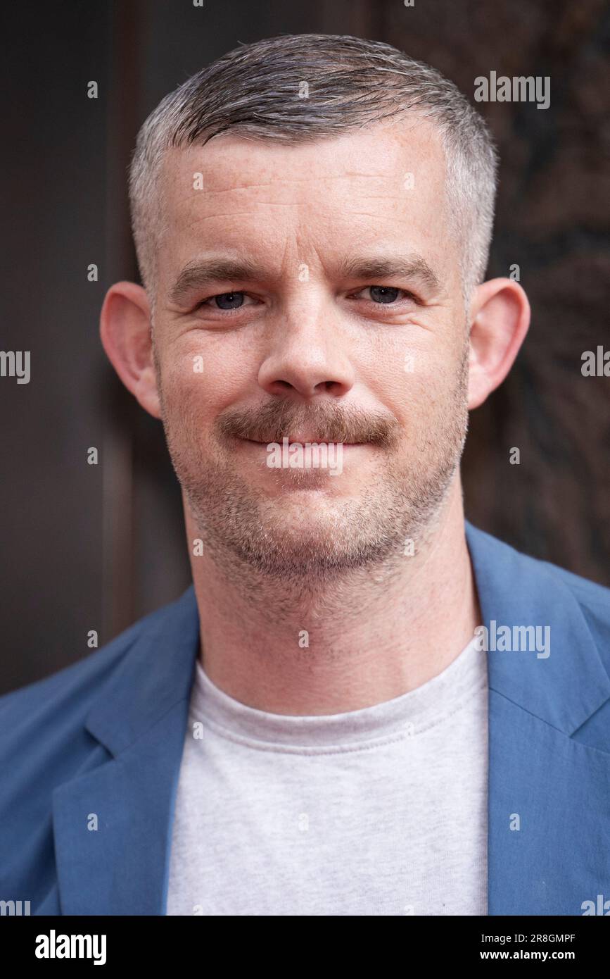 Russell Tovey poses for photographers upon arrival at the National ...