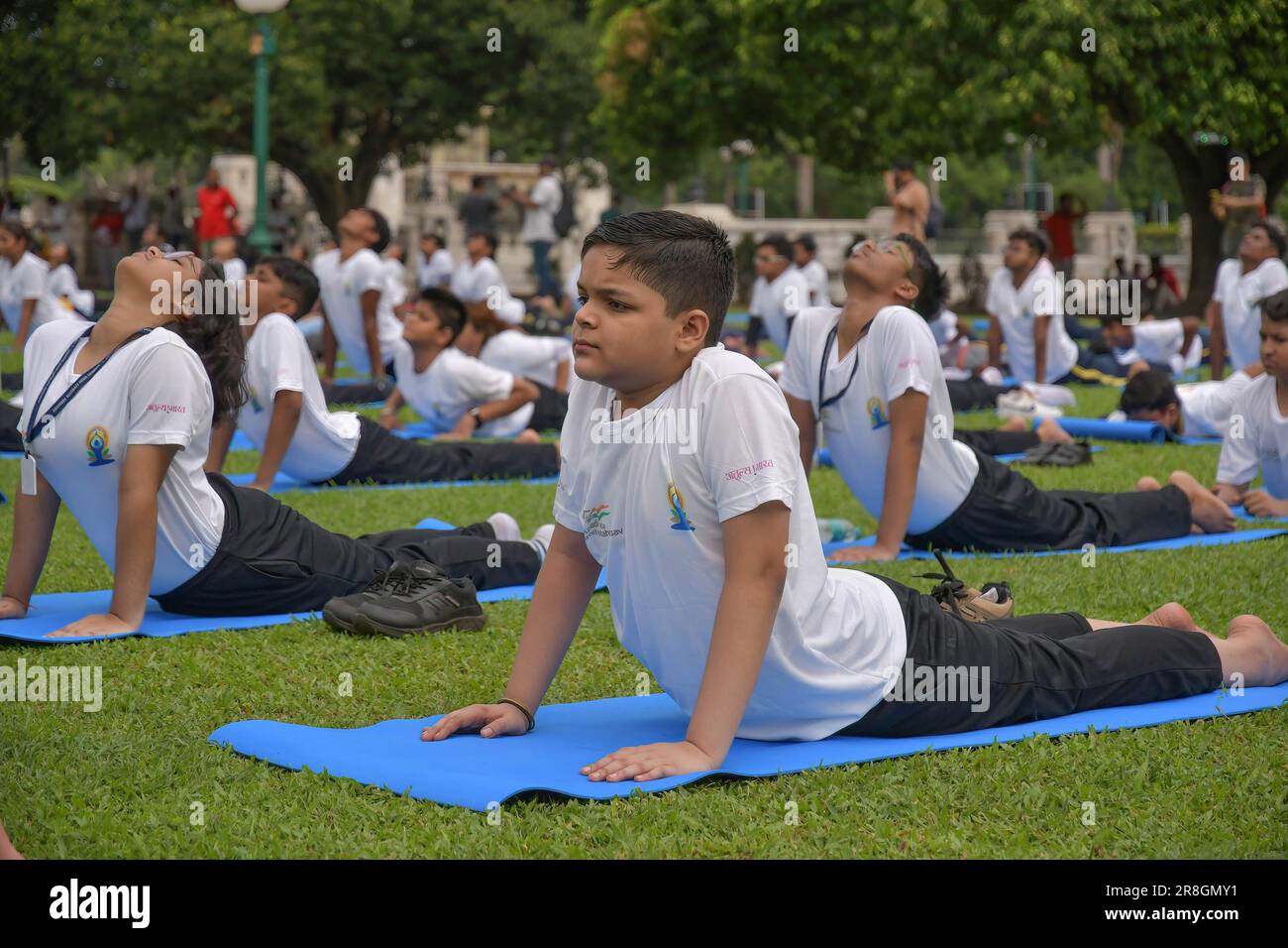 Students participate during the Yoga day at Victoria memorial hall ...