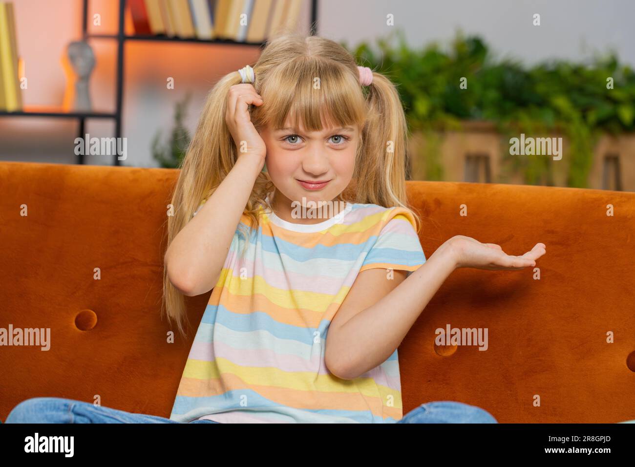 I dont know what to say. Confused Caucasian preteen school girl feeling ...