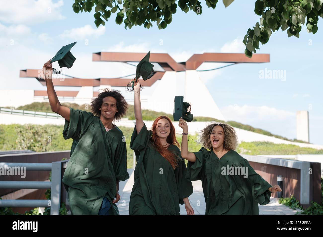 Young people celebrating their graduation at the end of their ...