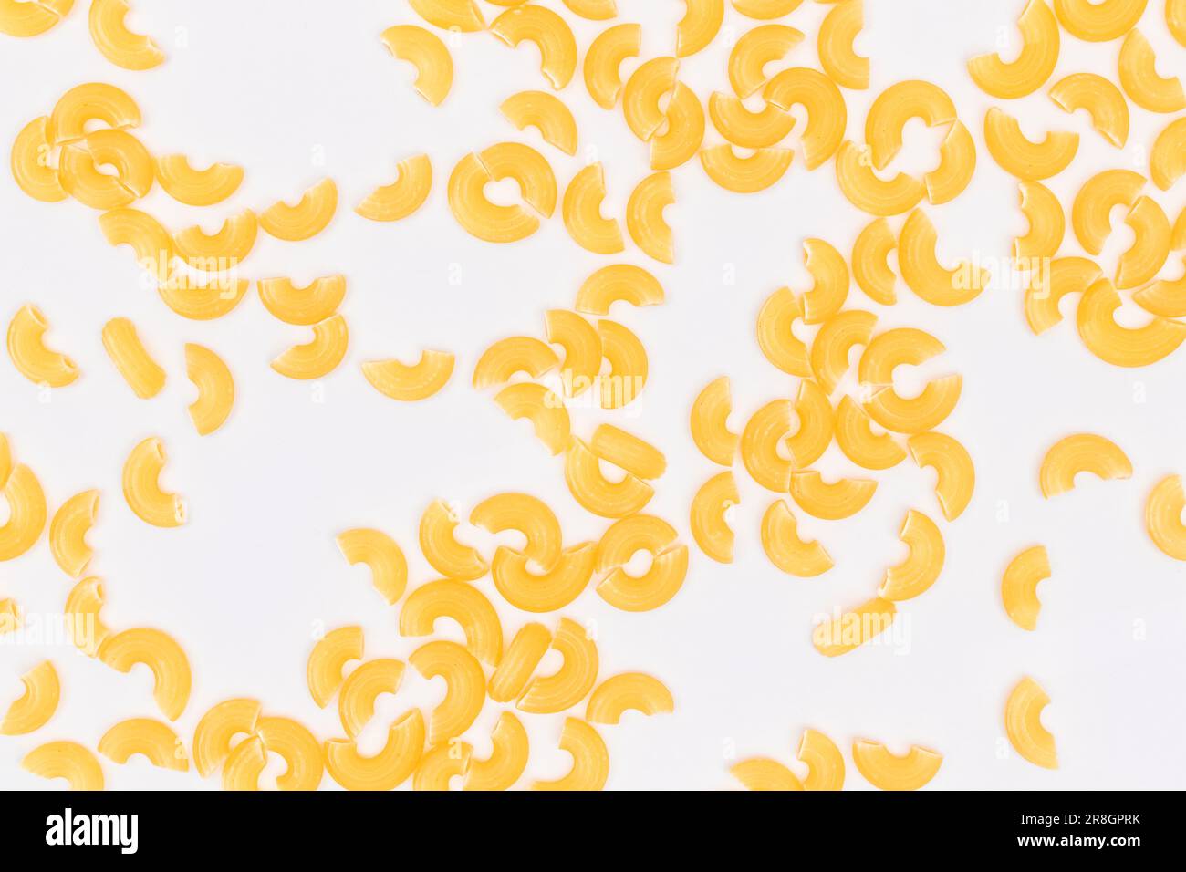 Scattered Uncooked Chifferi Rigati Pasta on White Background. Fat and ...