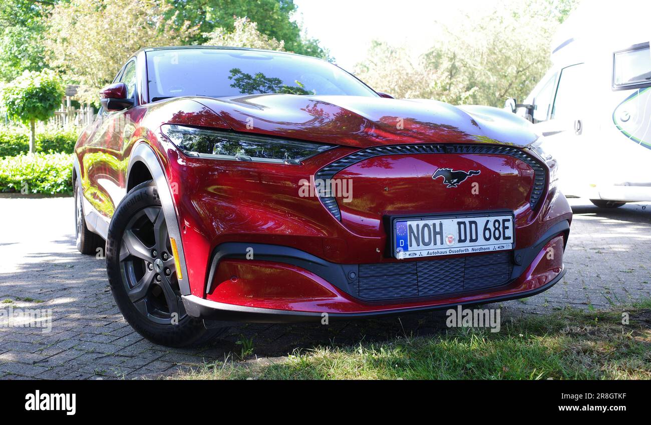 Lage, Germany - June 3 2023 A red Ford Mustang mach-e. The mach-e is a ...