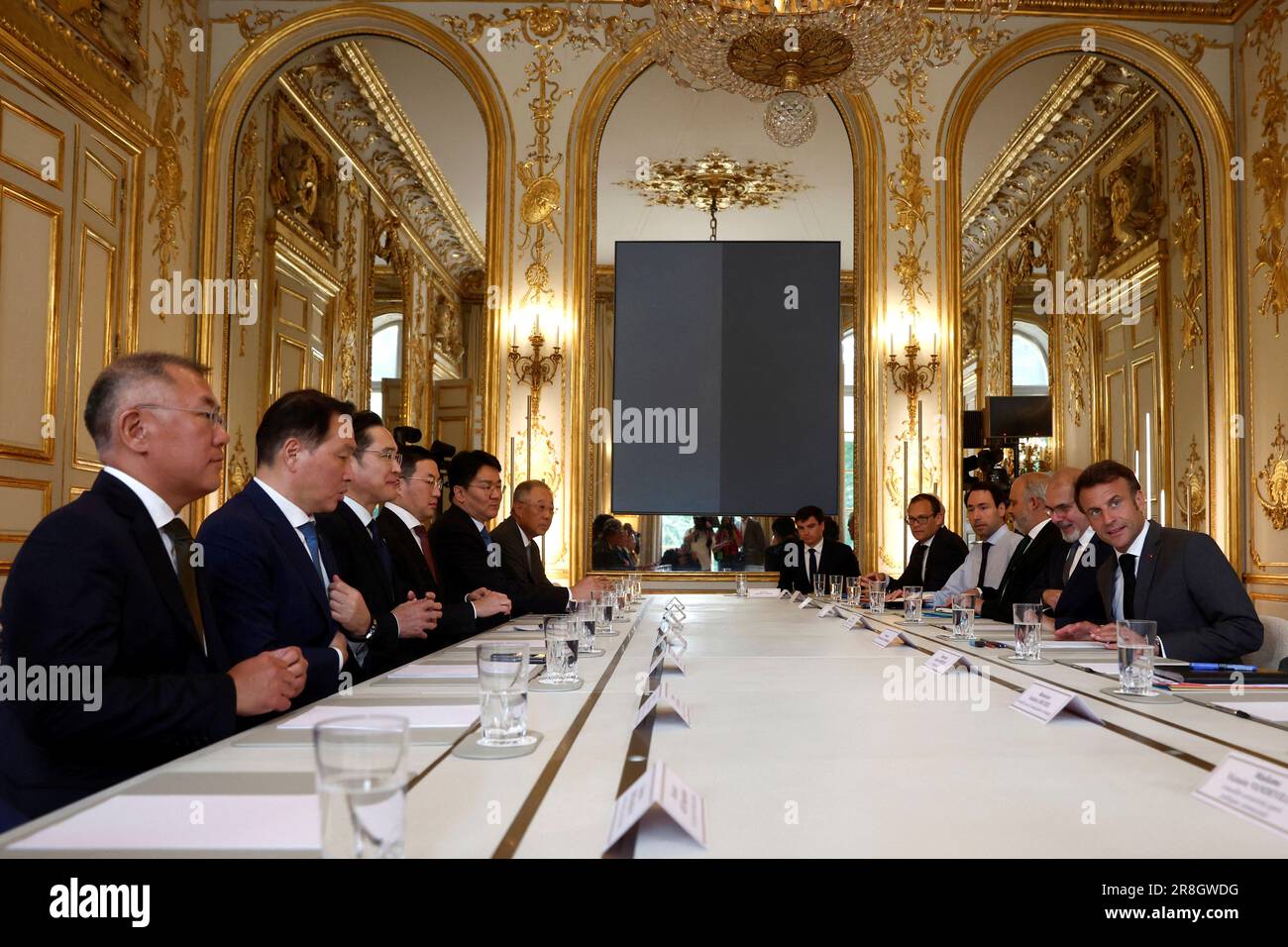French President Emmanuel Macron, right, attends a meeting with South ...