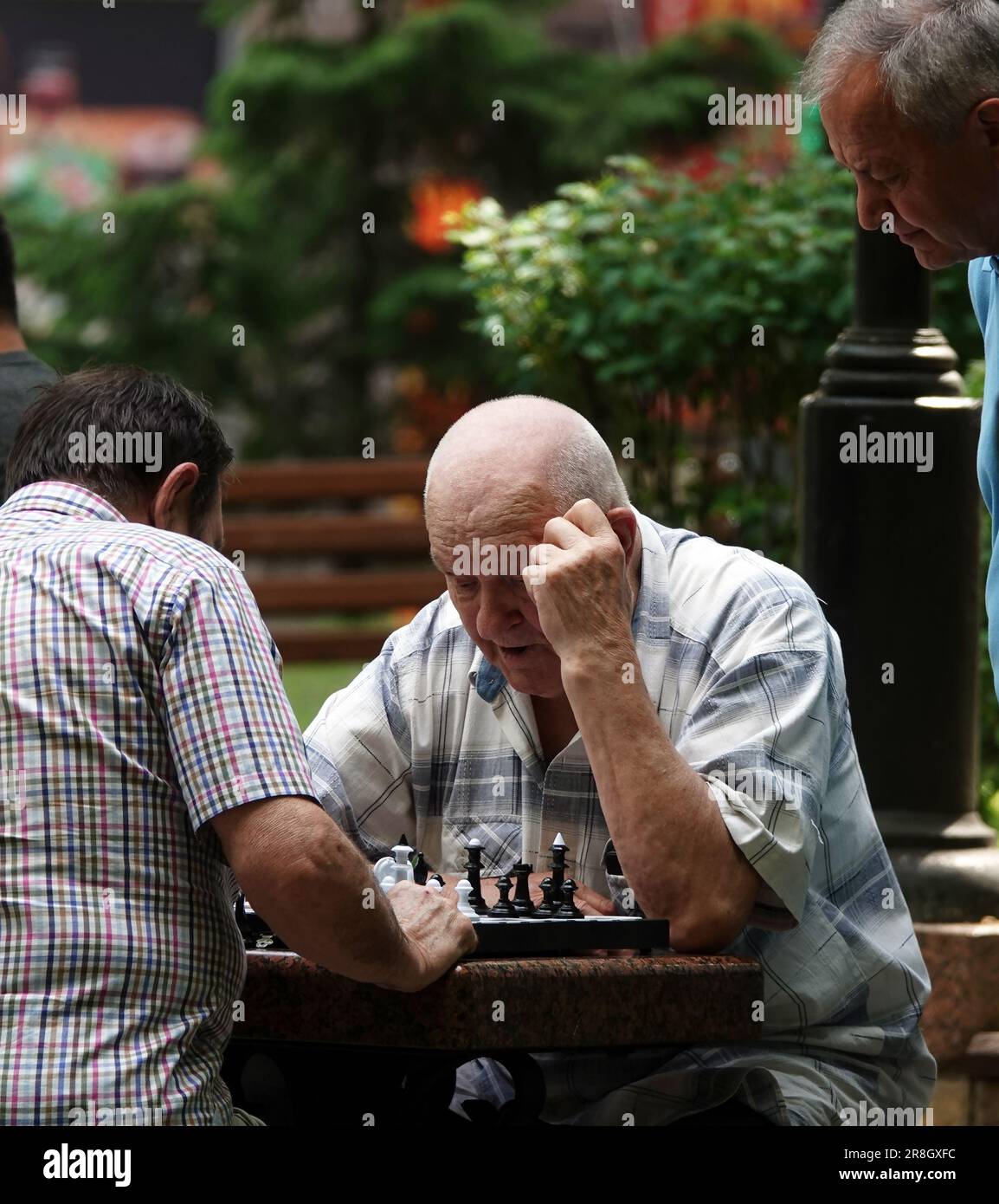 Kyiv, Ukraine June 17, 2023: Men in the Kiev park play chess Shevchenko ...