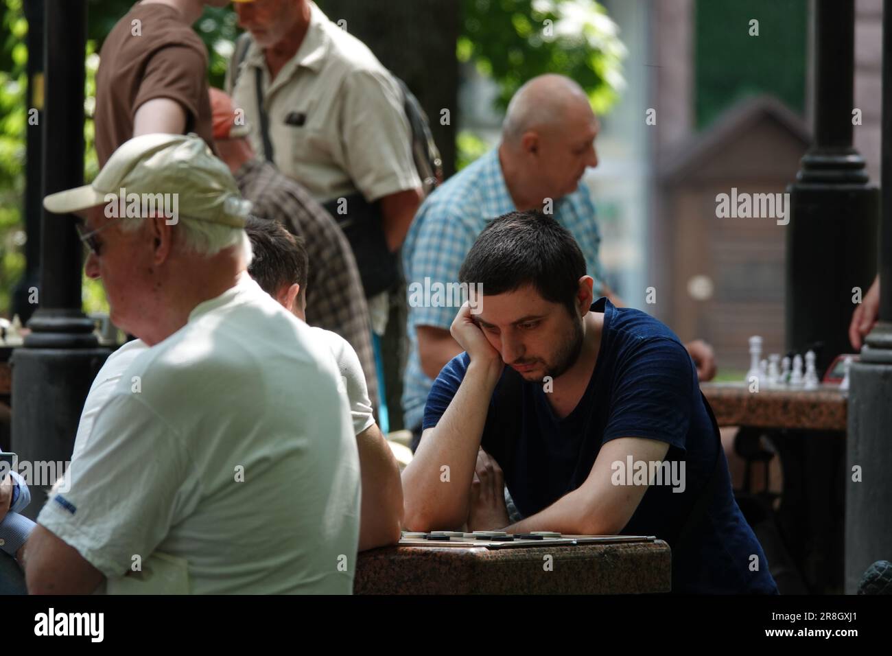 Kyiv, Ukraine June 17, 2023: Men in the Kiev park play chess Shevchenko ...