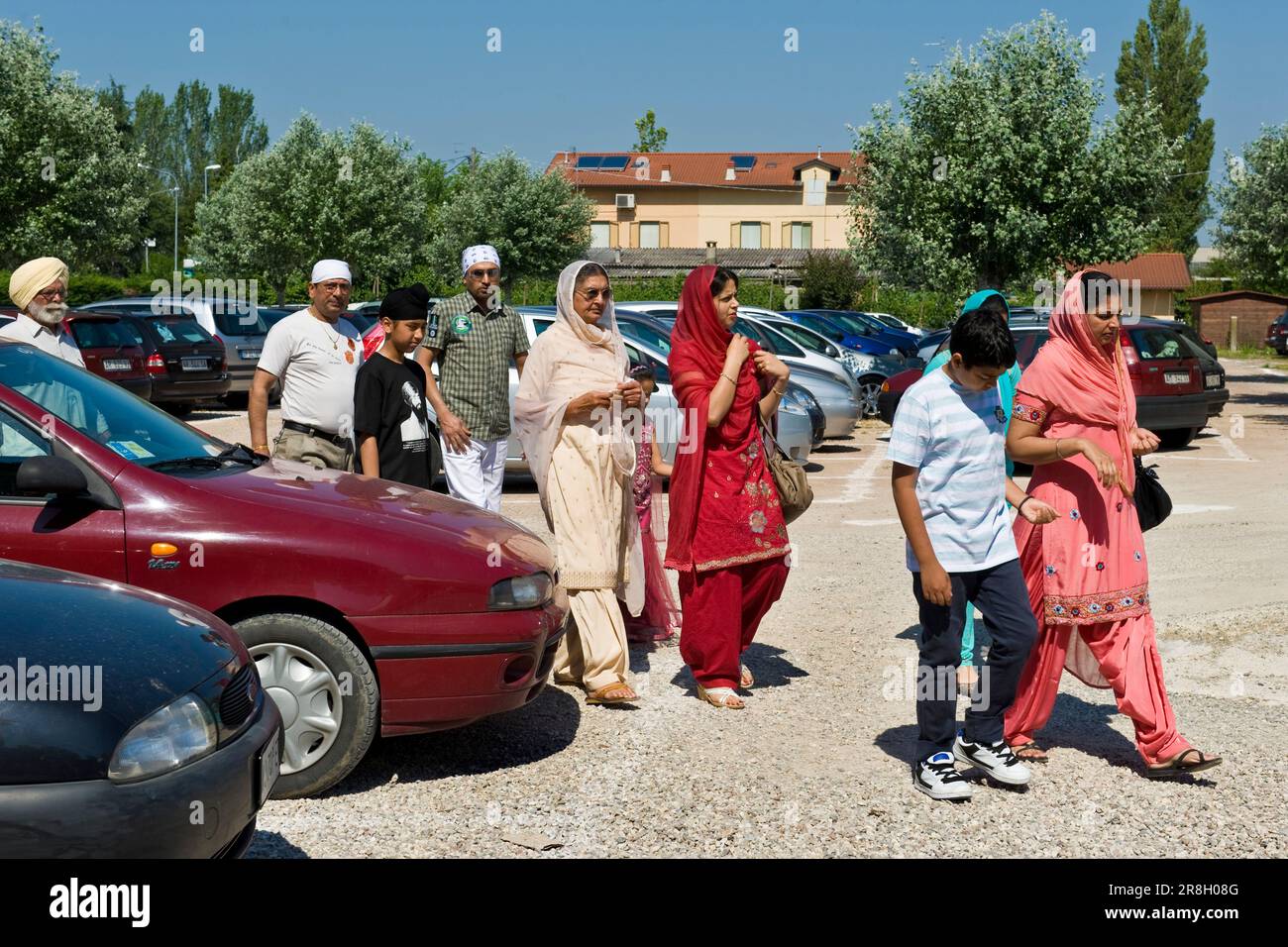 Daily life outside the temple. Sikh community. Sikhdharma Gurdwara ...