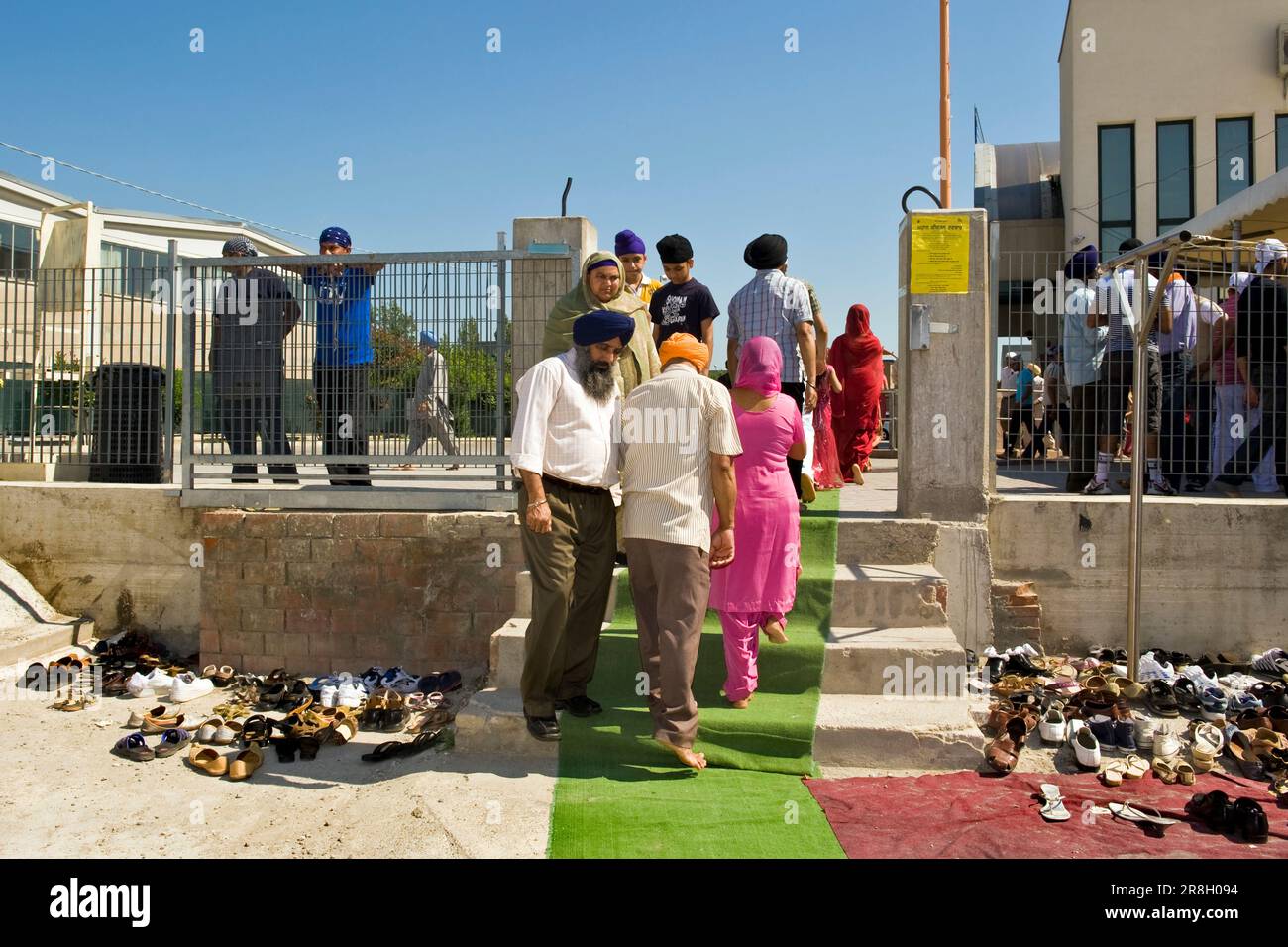 Daily life outside the temple. Sikh community. Sikhdharma Gurdwara ...