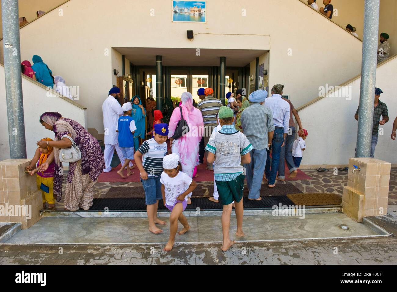 Daily life outside the temple. Sikh community. Sikhdharma Gurdwara ...
