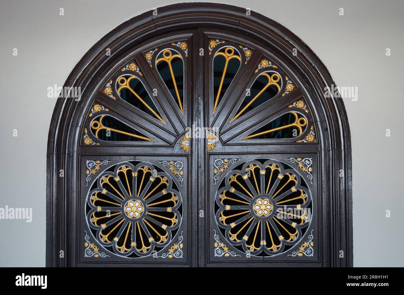 The ornate carved and painted doors to the famed wooden church, or the ...