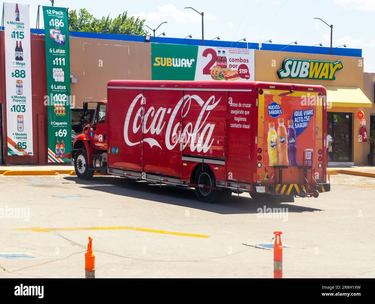 View from bus window big red Coca-Cola delivery truck lorry outside ...
