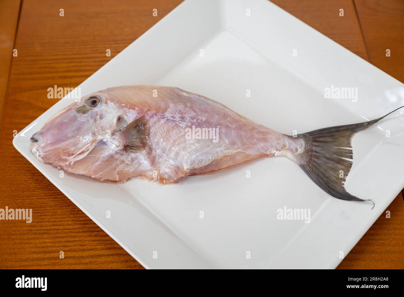Clean and seasoned Peroá fish (Balistes capriscus) . Typical fish from ...