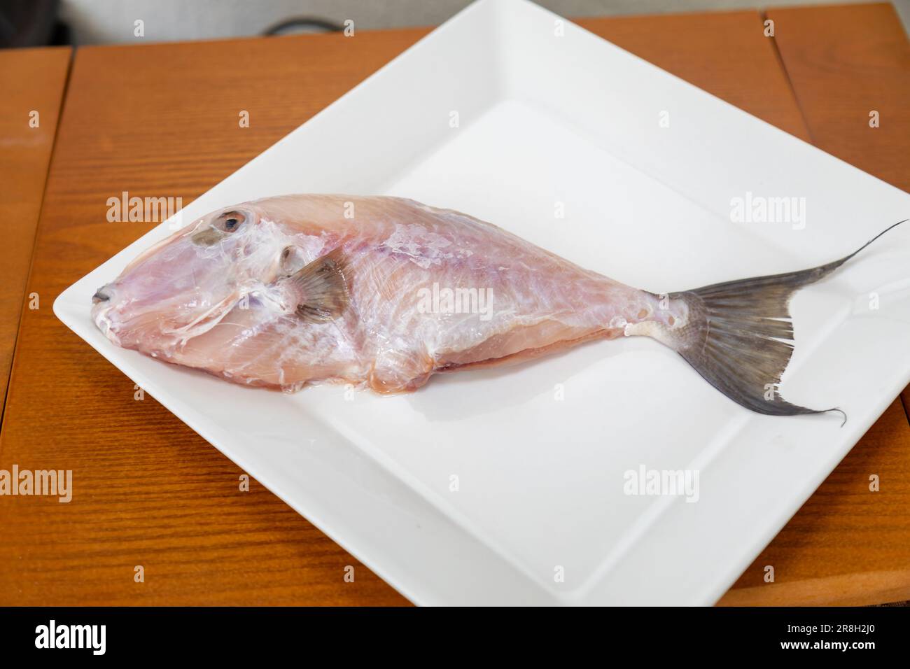 Clean and seasoned Peroá fish (Balistes capriscus) . Typical fish from ...