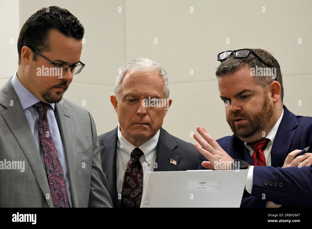 Members of the prosecution team, from left; legal assistant Aaron Savitski and Assistant State ...