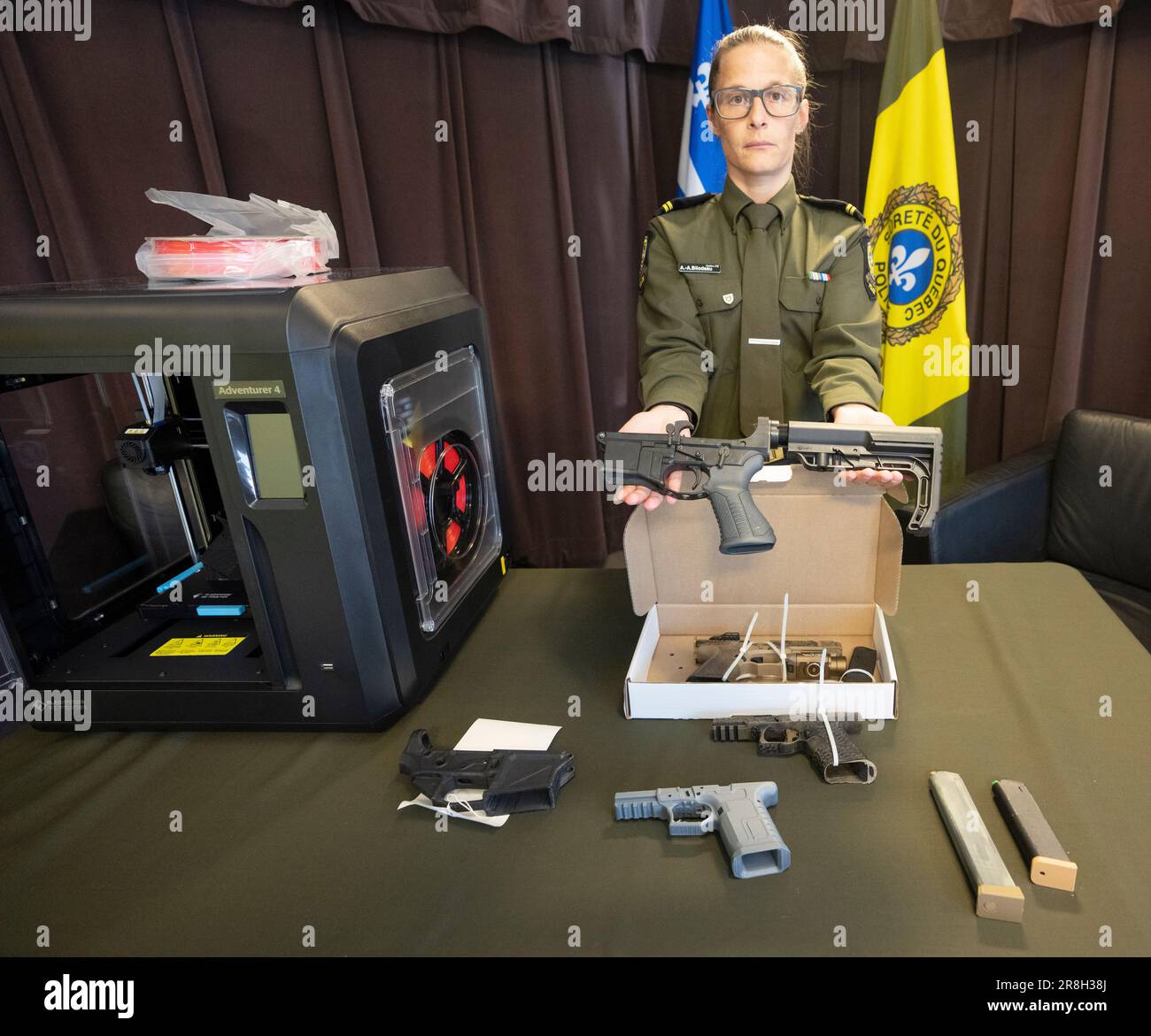 Montreal, Canada. 21st June, 2023. Sgt. Audrey-Ane Bilodeau shows some ...