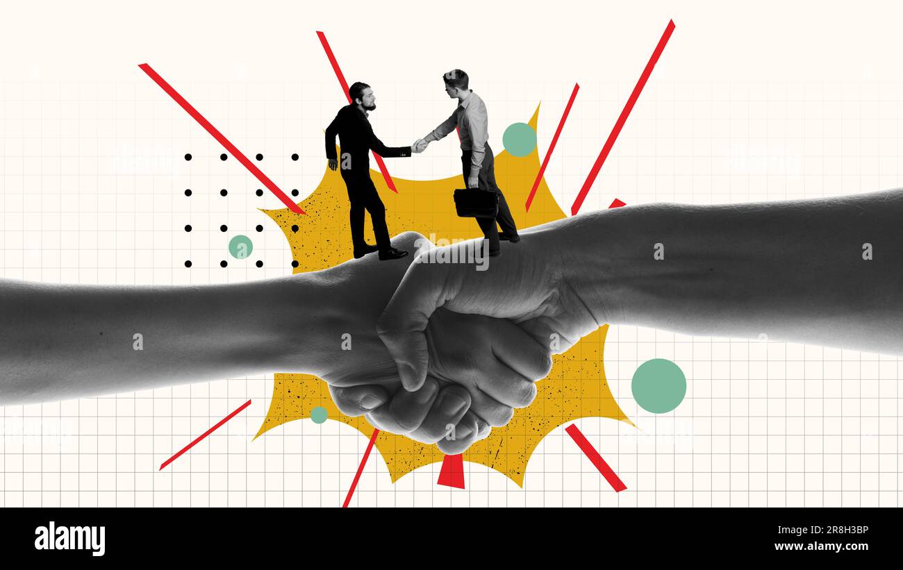 Two businessmen, employees shaking hands, having common business ...