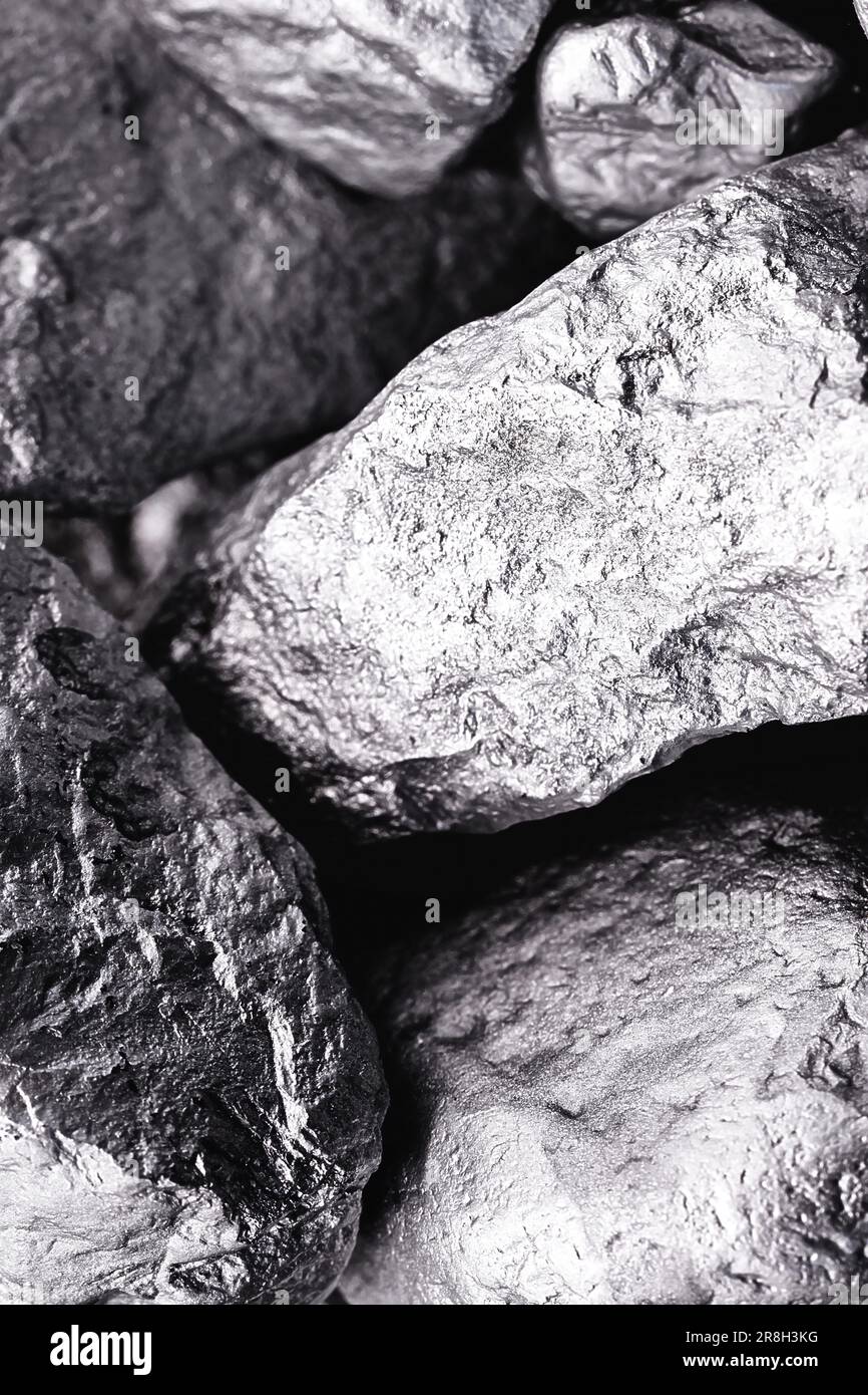 Raw manganese. Manganese stone isolated on black background. Mineral ...