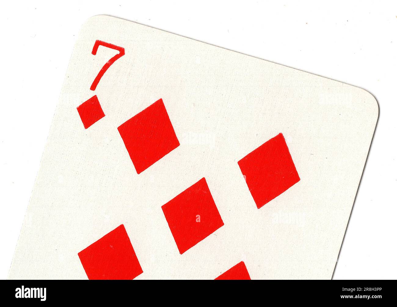 A seven of diamonds vintage playing card on a white background Stock ...