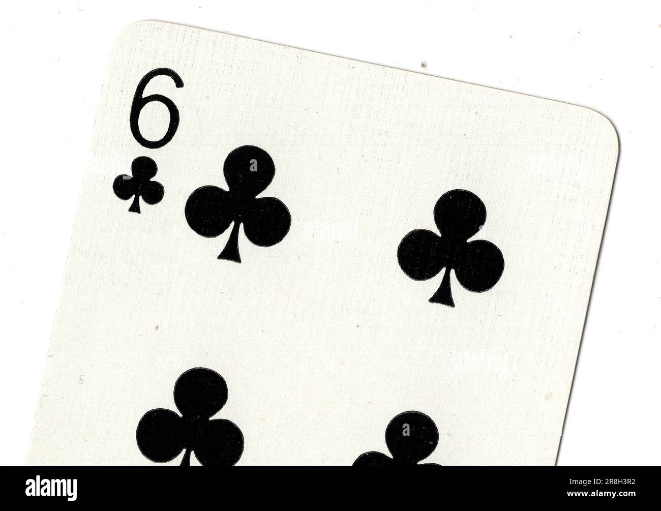 A six of clubs vintage playing card on a white background Stock Photo ...