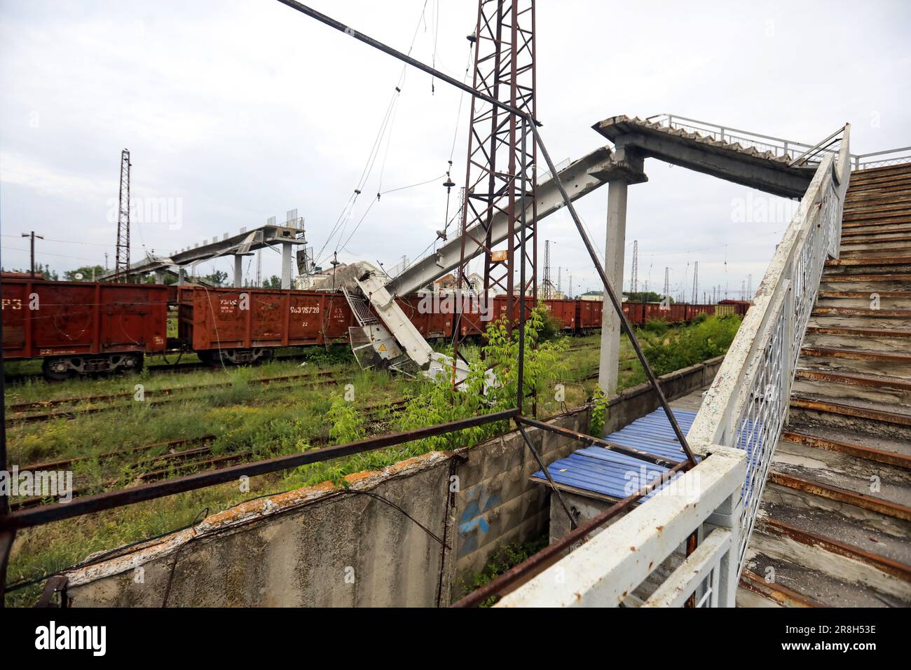 LYMAN, UKRAINE - JUNE 16, 2023 - An overhead pedestrian crossing above ...