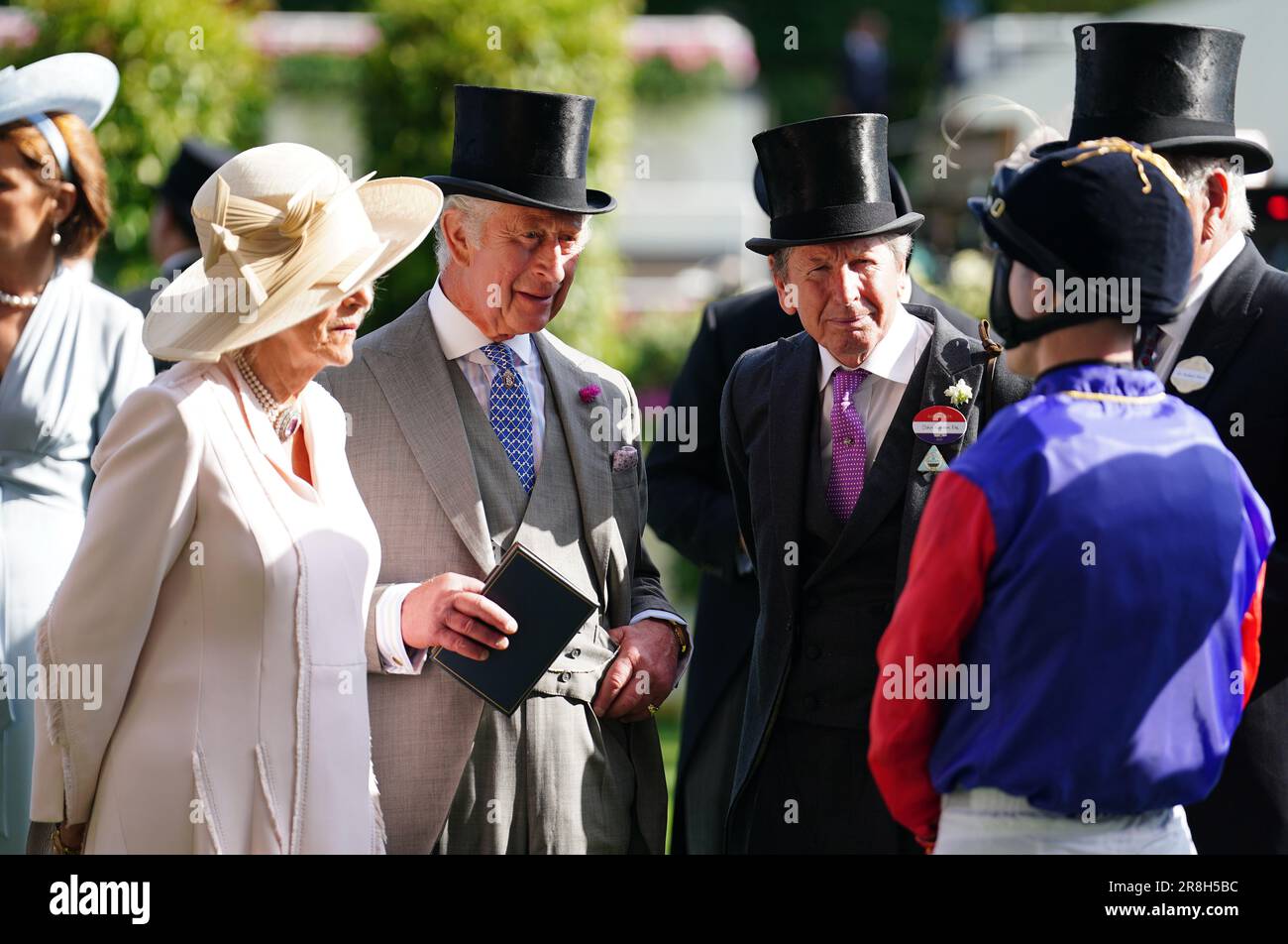 Queen Camilla, King Charles III and John Warren in the parade ring ...