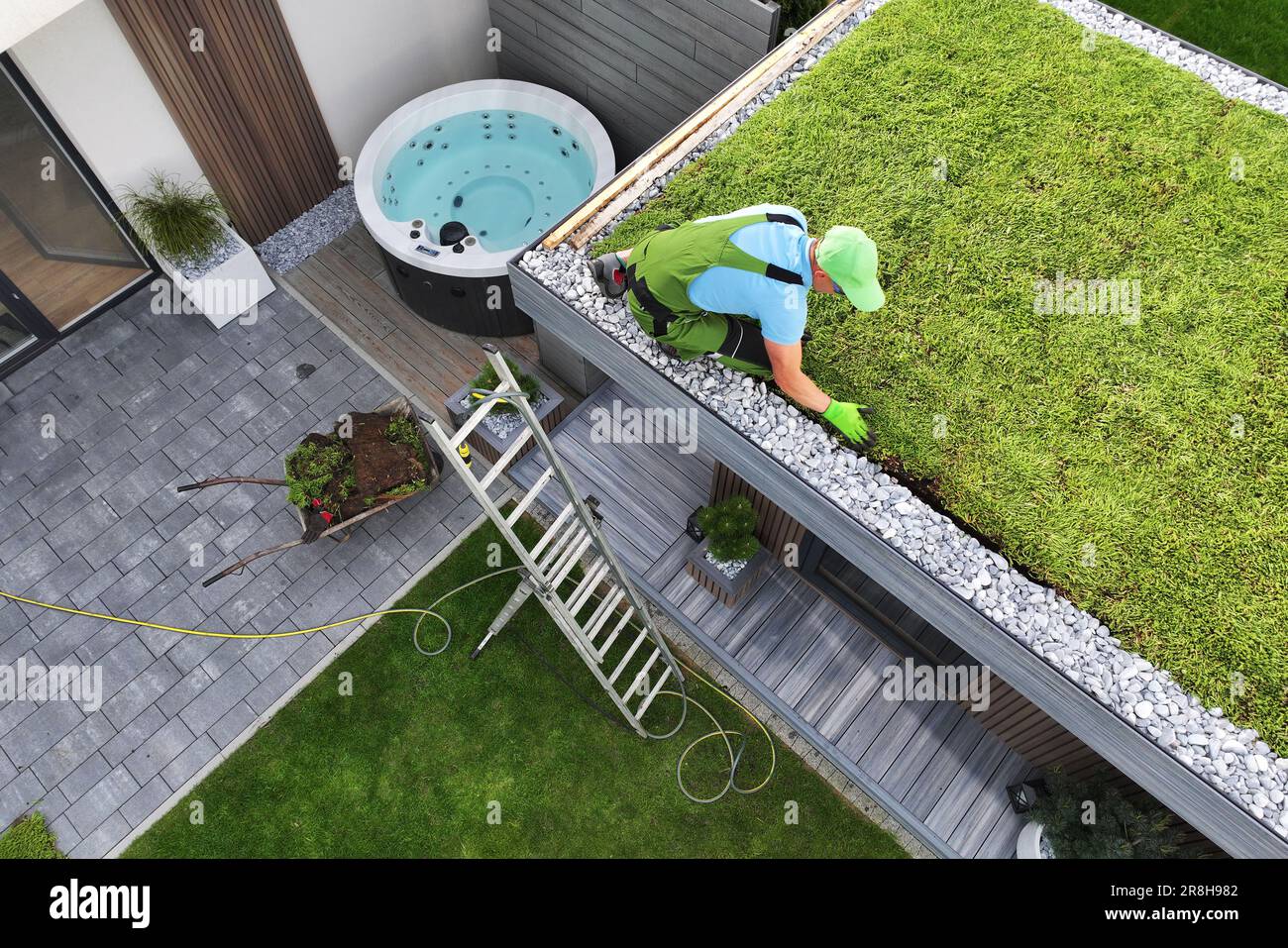 Top View of Professional Gardener Building Green Roof on Modern Garden ...