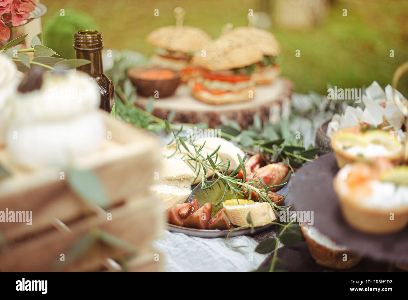 Rustic outdoor reception in elegant garden with gourmet local food ...