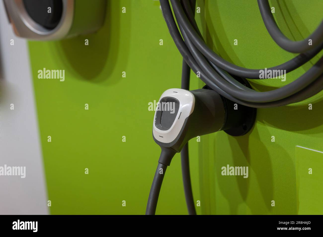 Charging for an electric car. Mid shot Stock Photo - Alamy