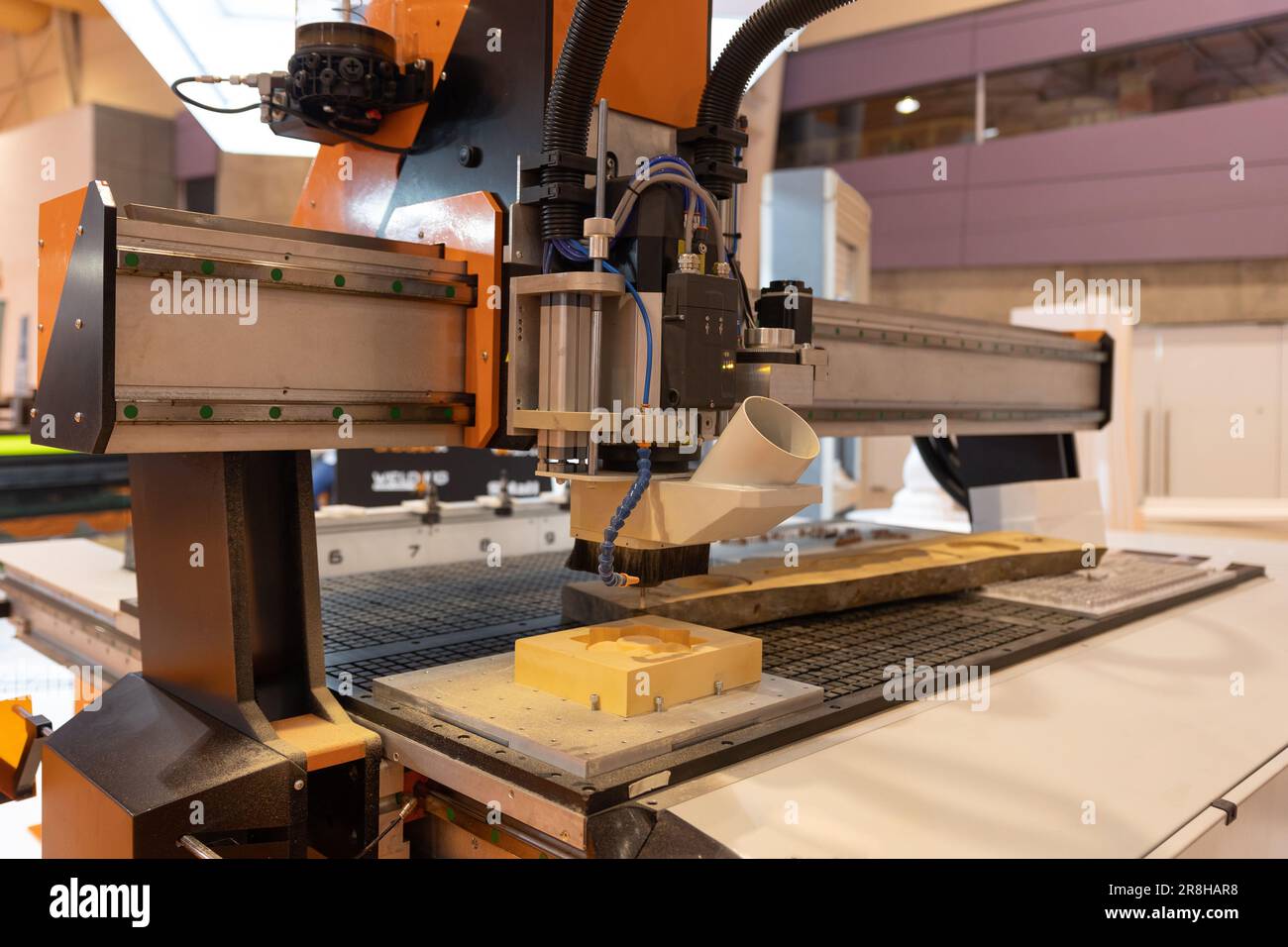 Modern Woodworking Machine At the expo of modern technologies. Mid shot ...