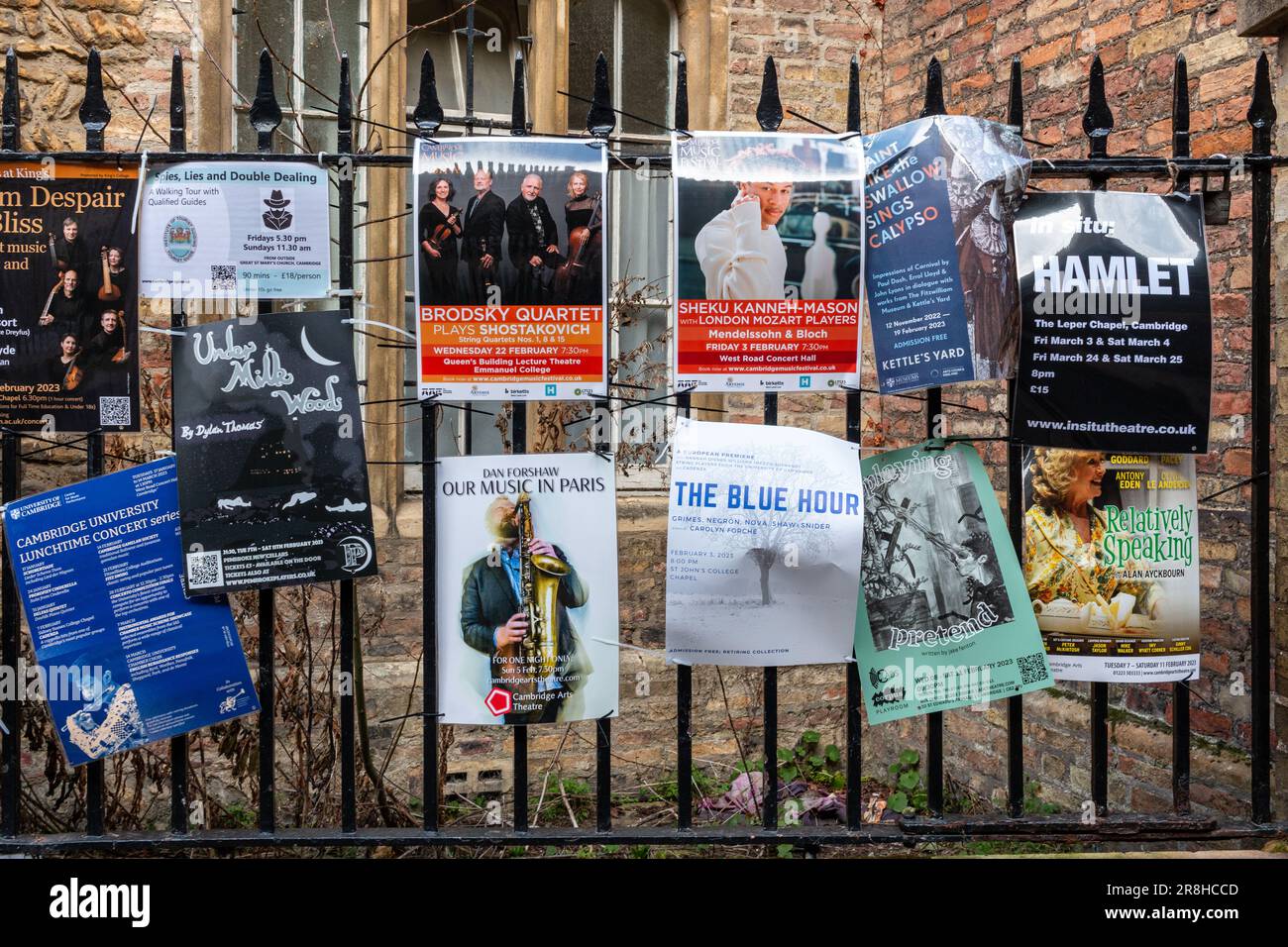 Posters advertising theatrical shows and musical concerts are attached ...