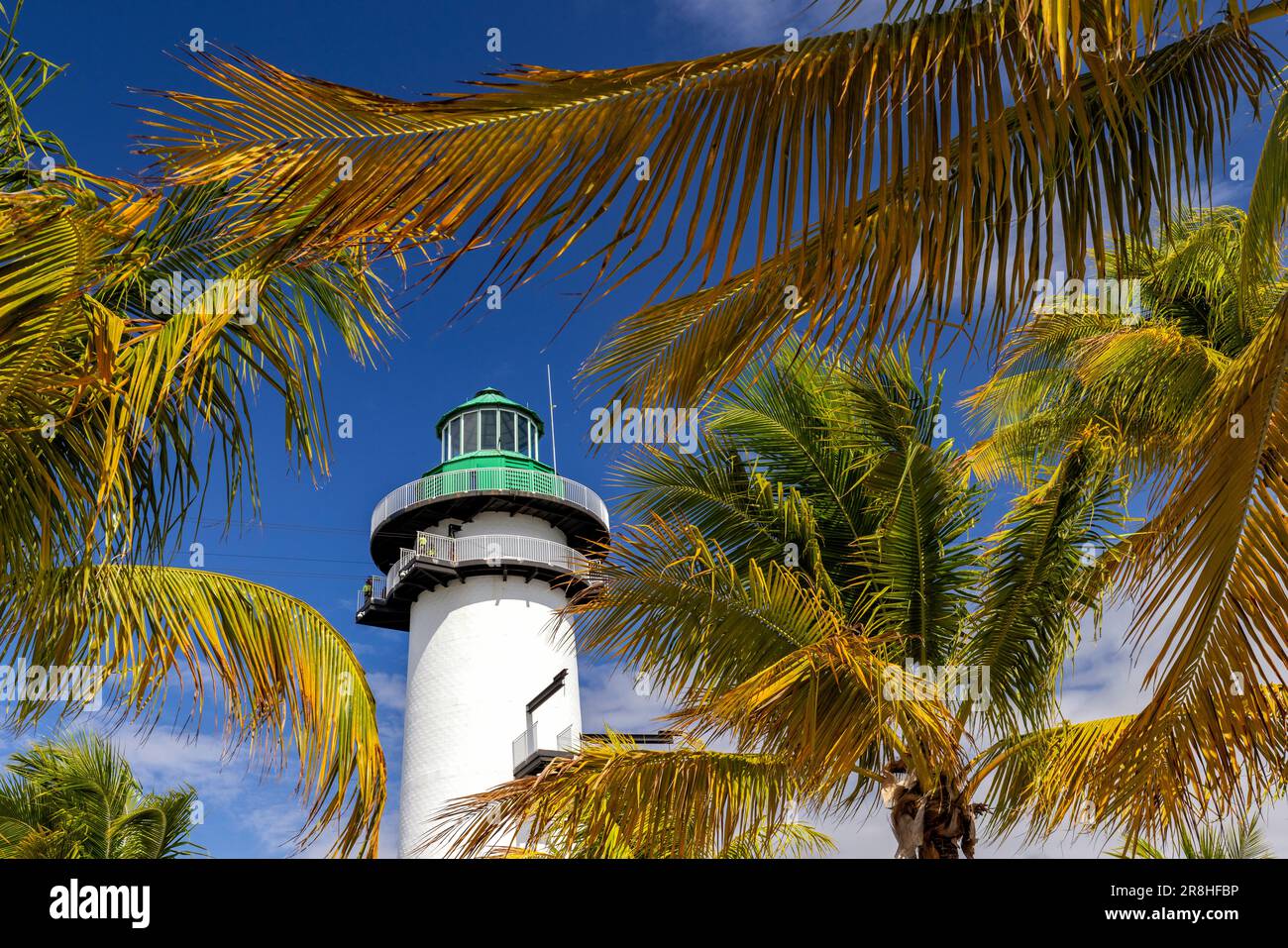 Tropical landscape and lighthouse ("flighthouse") on Harvest Caye ...