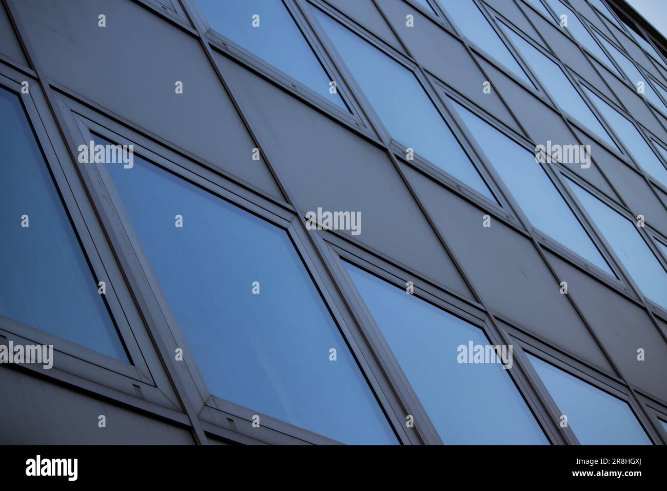 Modern freshly constructed urban building, combined steel with glass ...