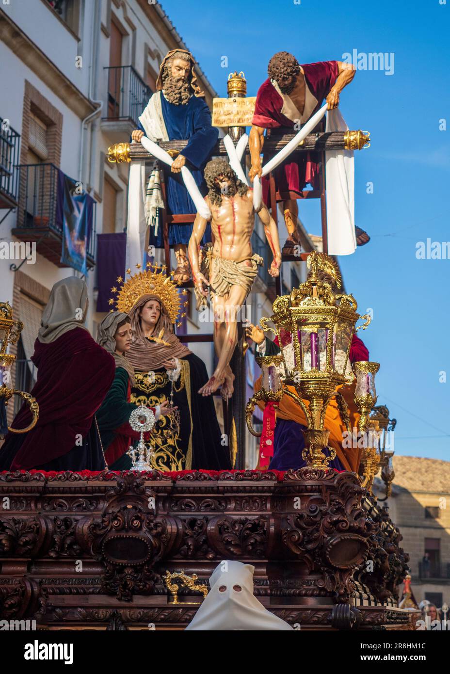 The throne with the figure of Jesus Christ on the cross next to the ...