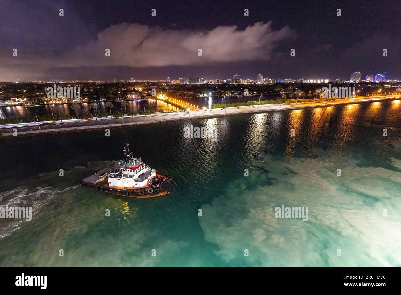Seabulk Towing's tractor tug (HAWK) in the Port of Miami at night ...