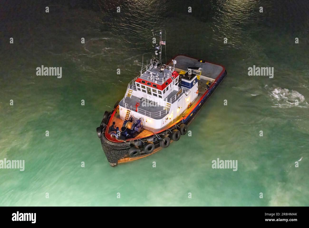 Seabulk Towing's tractor tug (HAWK) in the Port of Miami at night ...