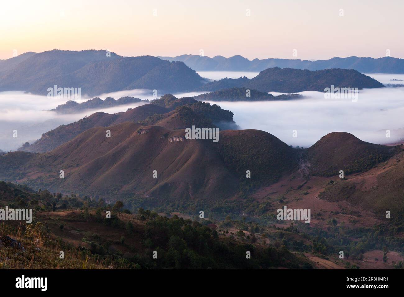 Mountain valleys with morning clouds, Myanmar. Landscape on the trek ...