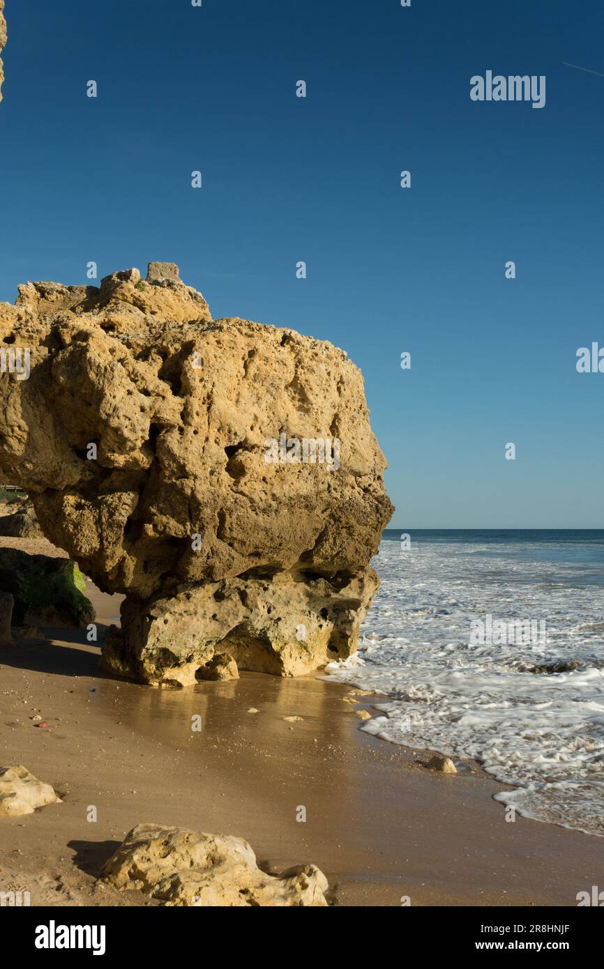 This scenic beach features a variety of rocky formations, providing a ...