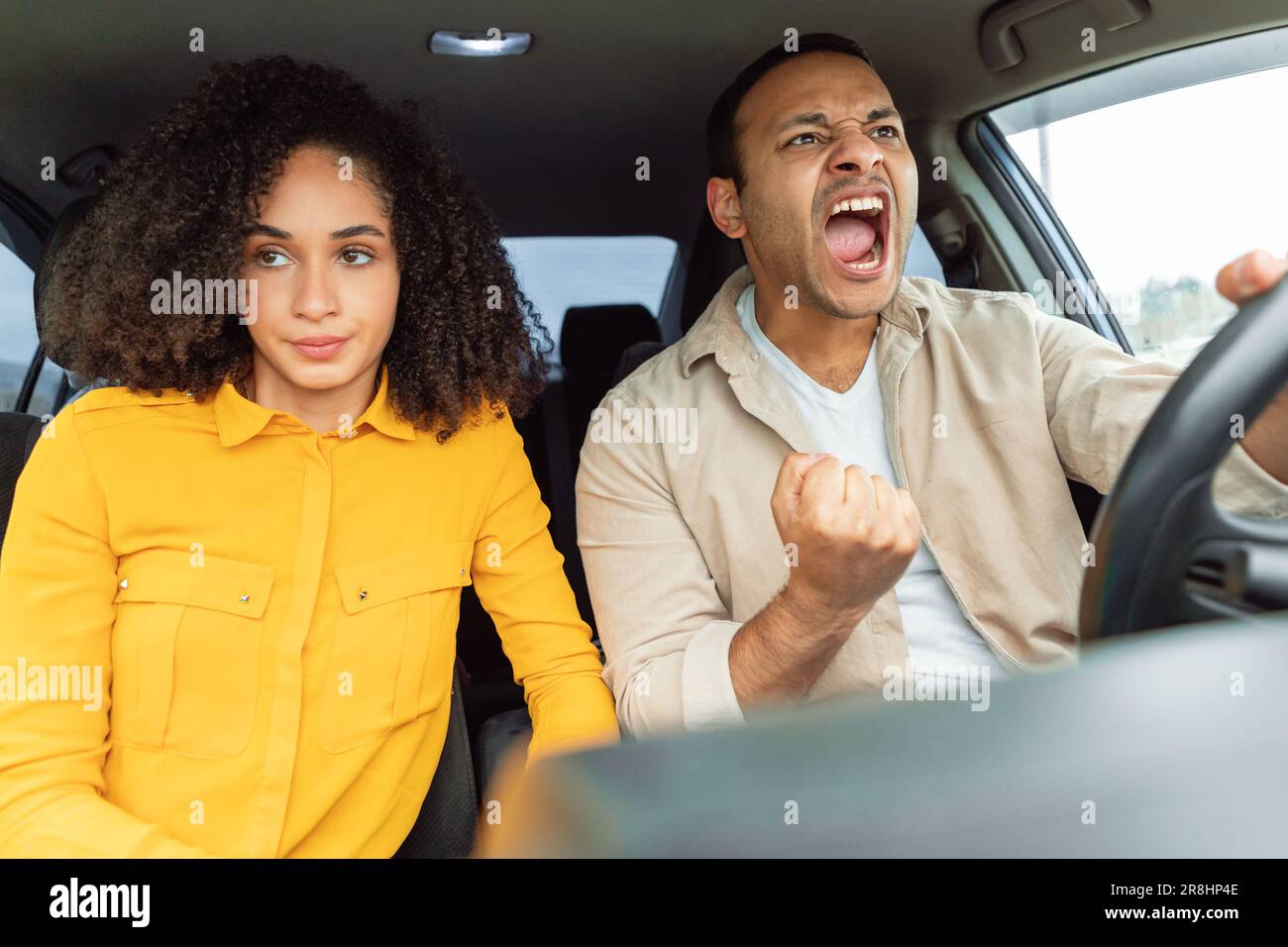 Woman Feeling Uncomfortable In Automobile With Risky Driver Man Stock ...
